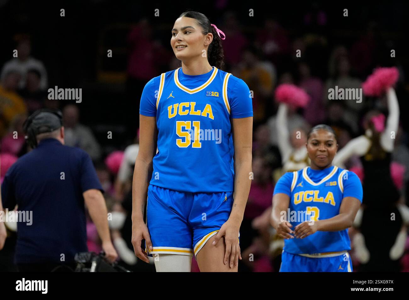 UCLA center Lauren Betts stands on the court before an NCAA college ...