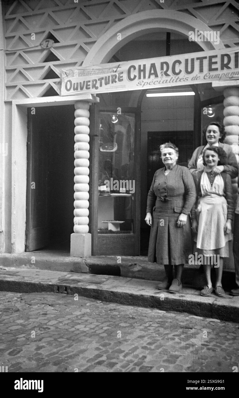 Shopkeepers Pose Outside Charcterie Shop in France. Vintage or Historic ...