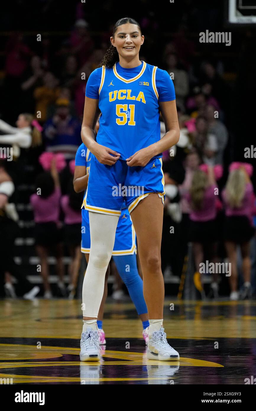 UCLA center Lauren Betts stands on the court before an NCAA college ...