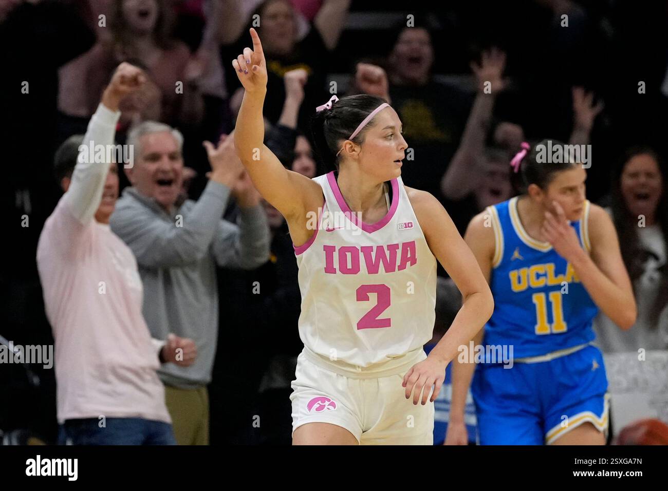 Iowa guard Taylor McCabe (2) celebrates after making a three-point ...
