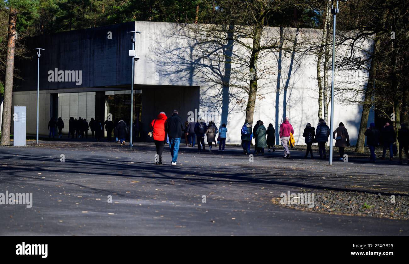 Bergen, Germany. 17th Feb, 2025. Visitors to the documentation center ...