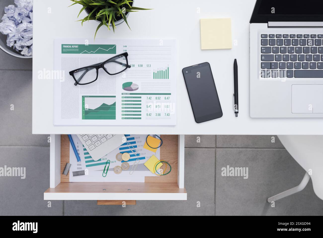 Business executive work desk with financial chart and open drawer Stock ...