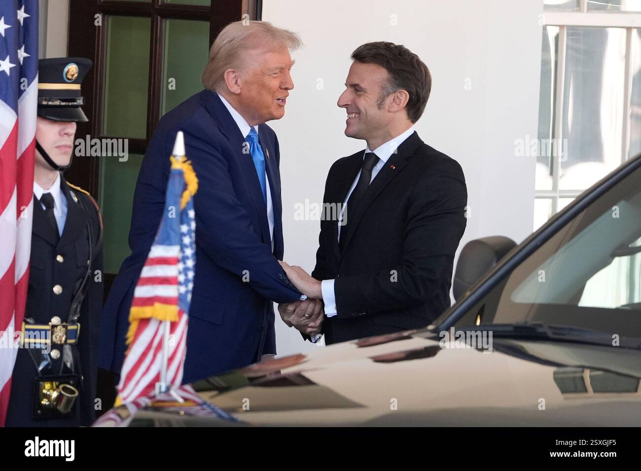 President Donald Trump, left, greets France's President Emmanuel Macron ...