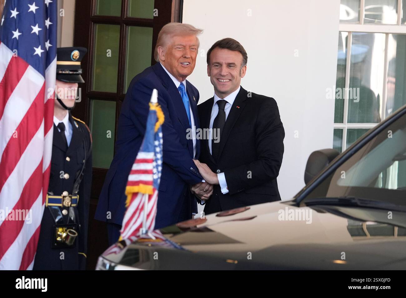 President Donald Trump, left, greets France's President Emmanuel Macron ...