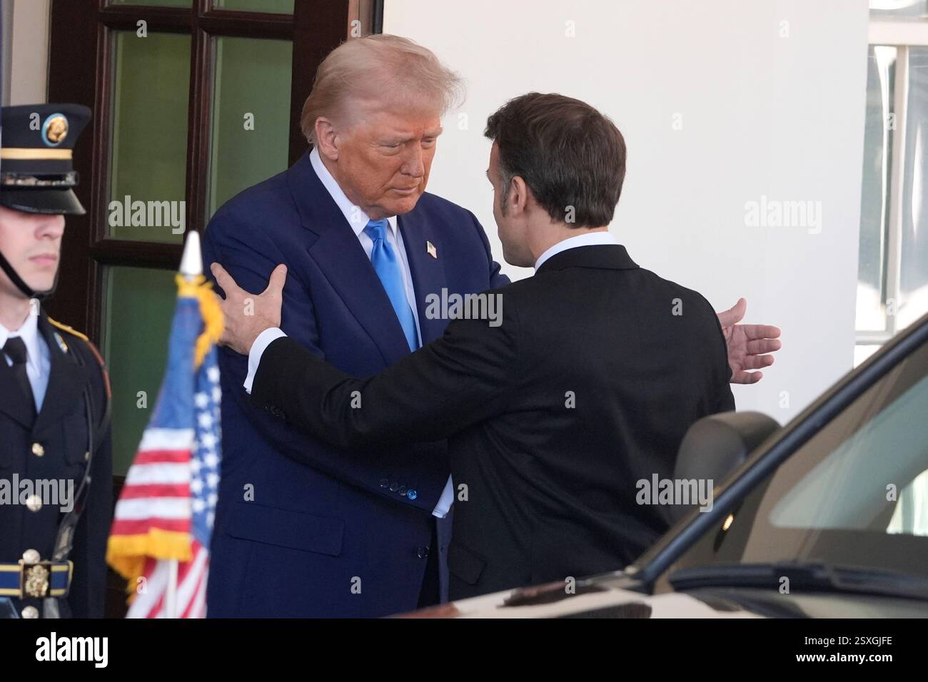 President Donald Trump, left, greets France's President Emmanuel Macron ...