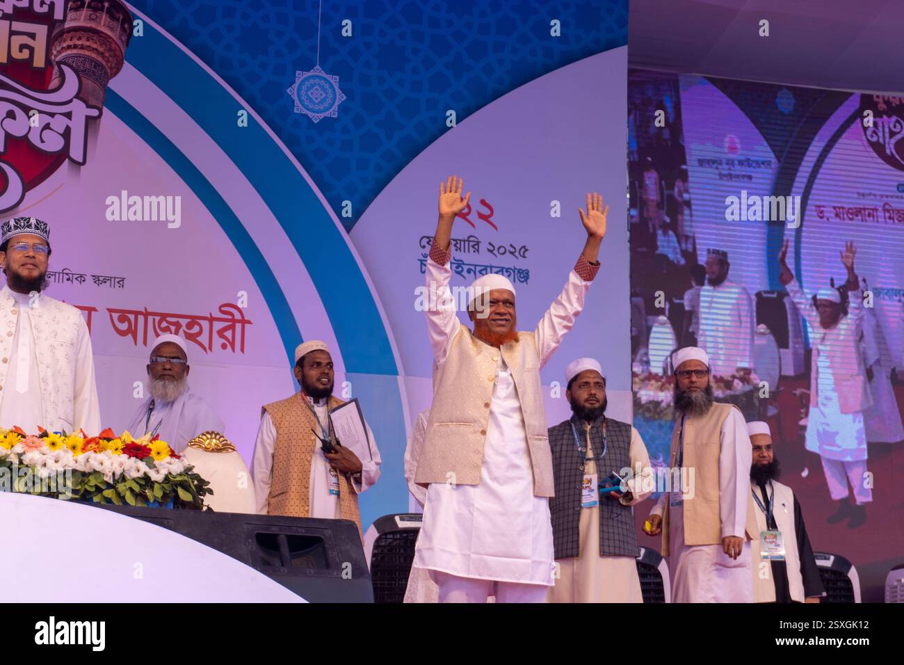 Jamaat-e-Islami leader Narul Islam Bulbul waves greetings to the crowd ...