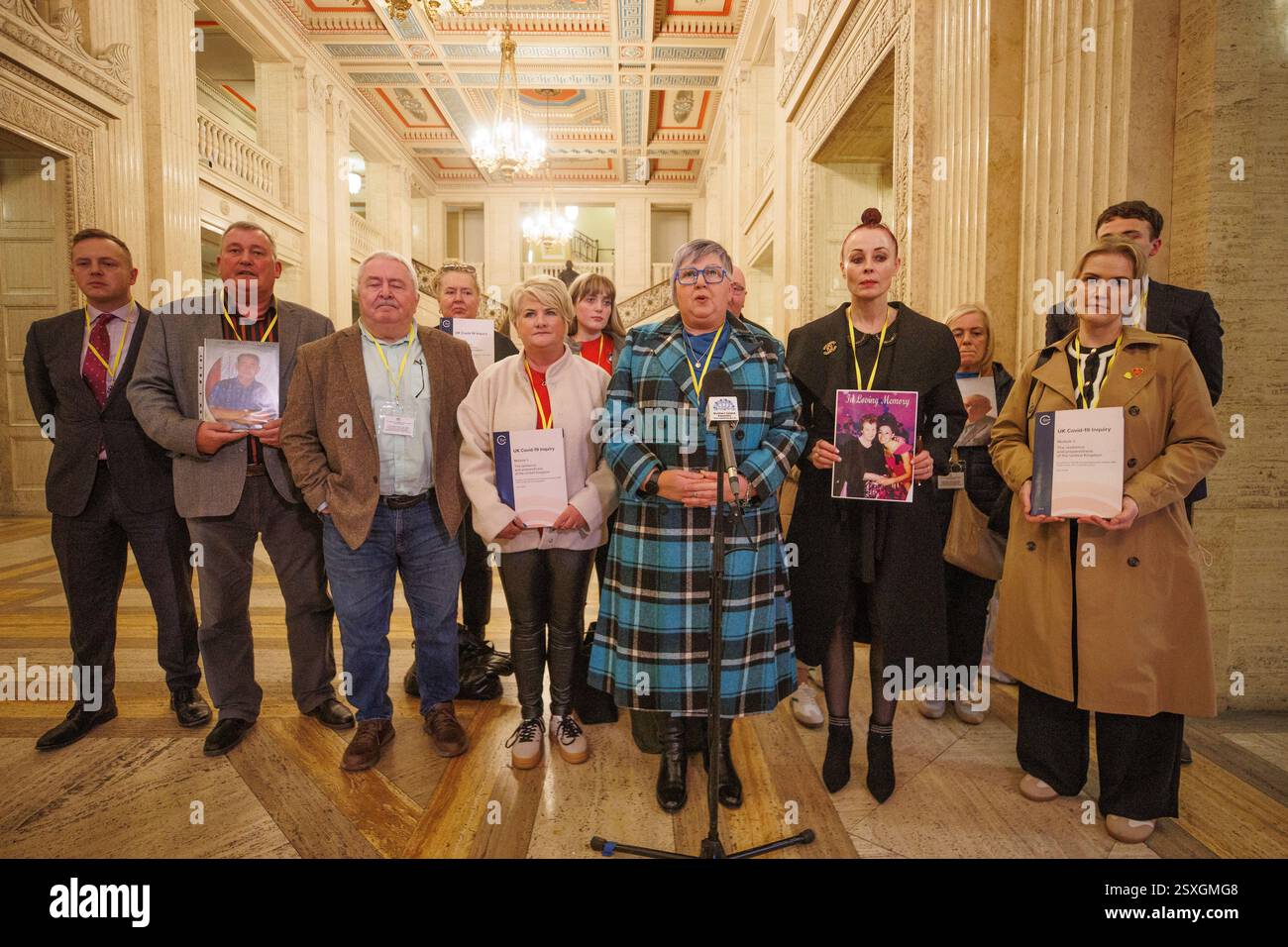 Brenda Doherty (centre right) speaking to the media with members of the ...