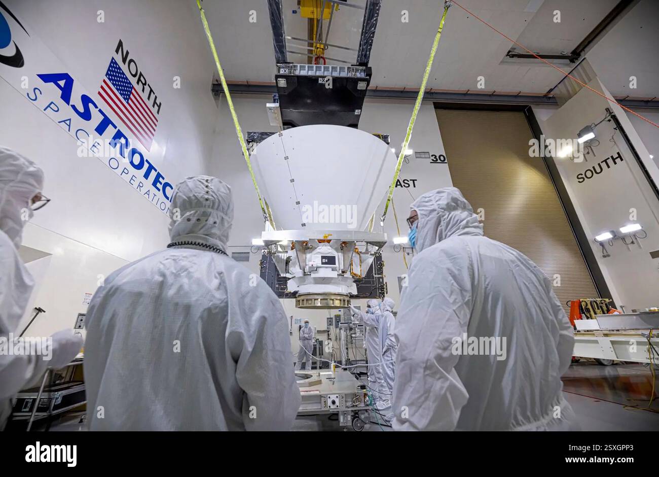 This image provided by NASA shows BAE Systems employees working on NASA ...