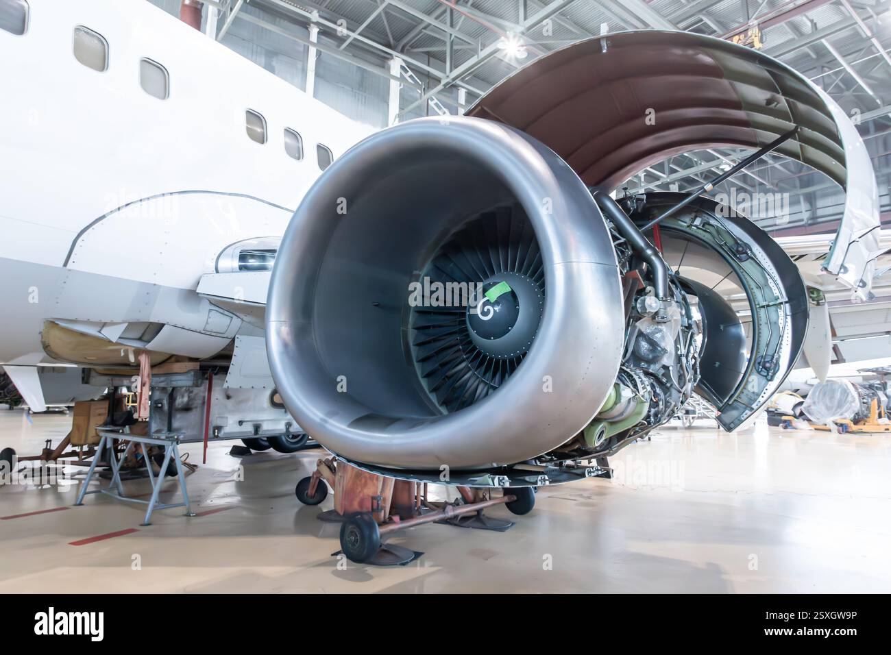 Close-up of an open high bypass turbofan aircraft engine of a passenger ...