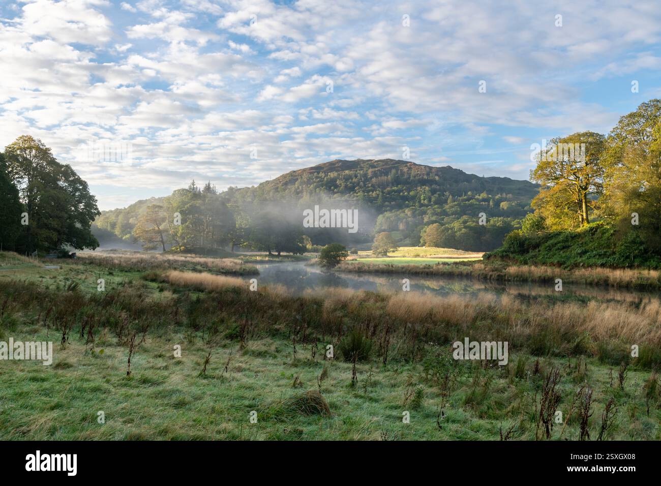 Beautiful morning at Elterwater Lake in the Lake District national park ...