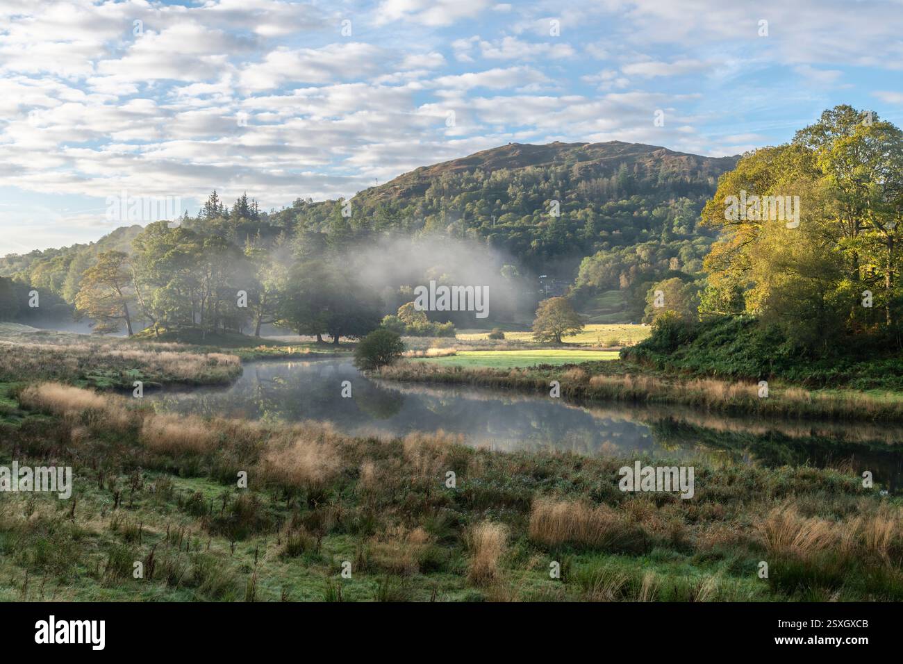 Beautiful morning at Elterwater Lake in the Lake District national park ...