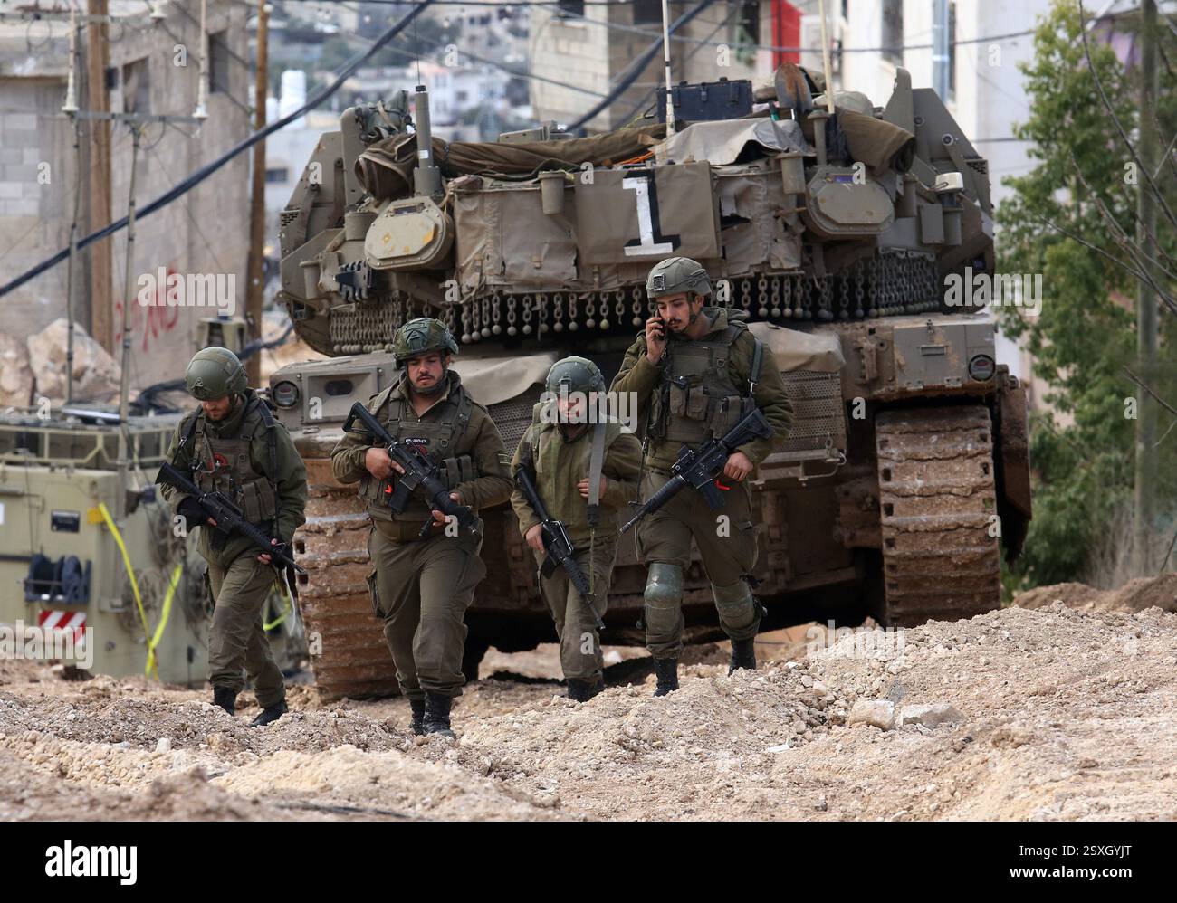 Jenin. 24th Feb, 2025. Israeli soldiers are seen during a military ...
