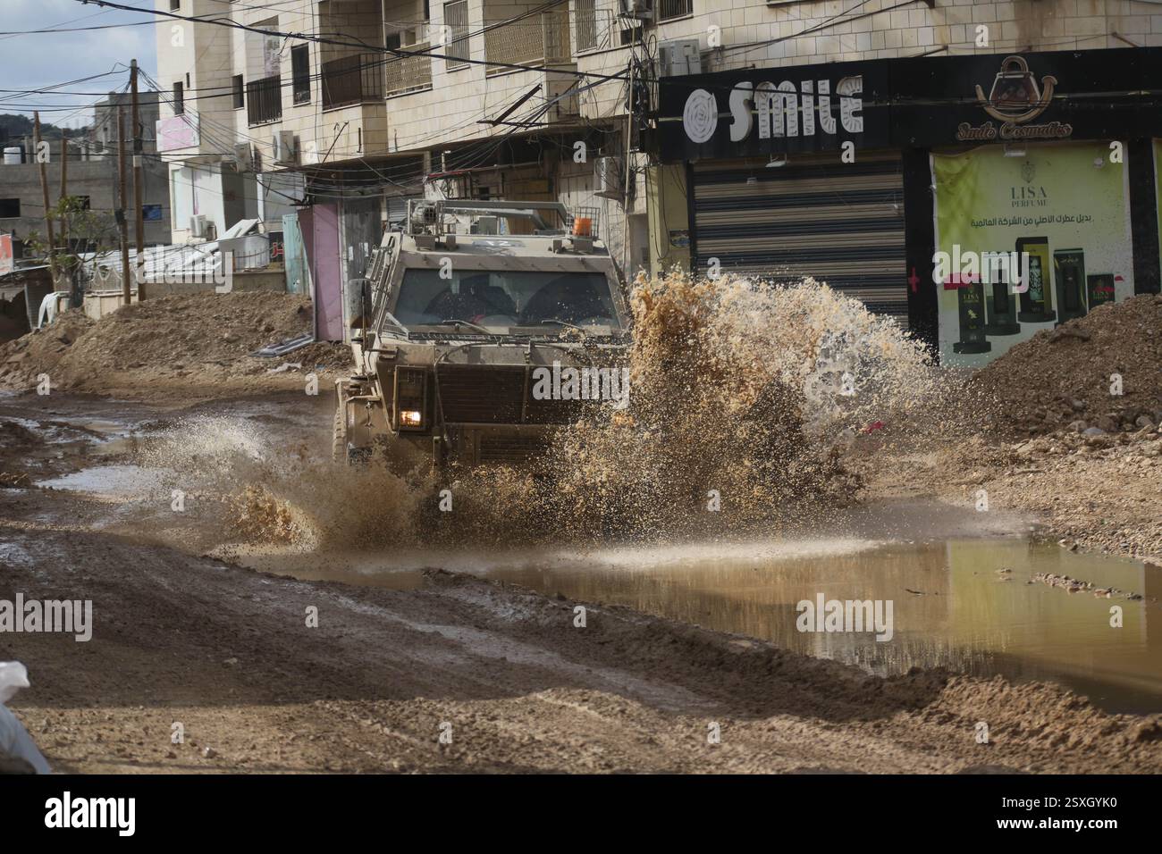 Jenin. 24th Feb, 2025. An Israeli military vehicle is seen during a ...