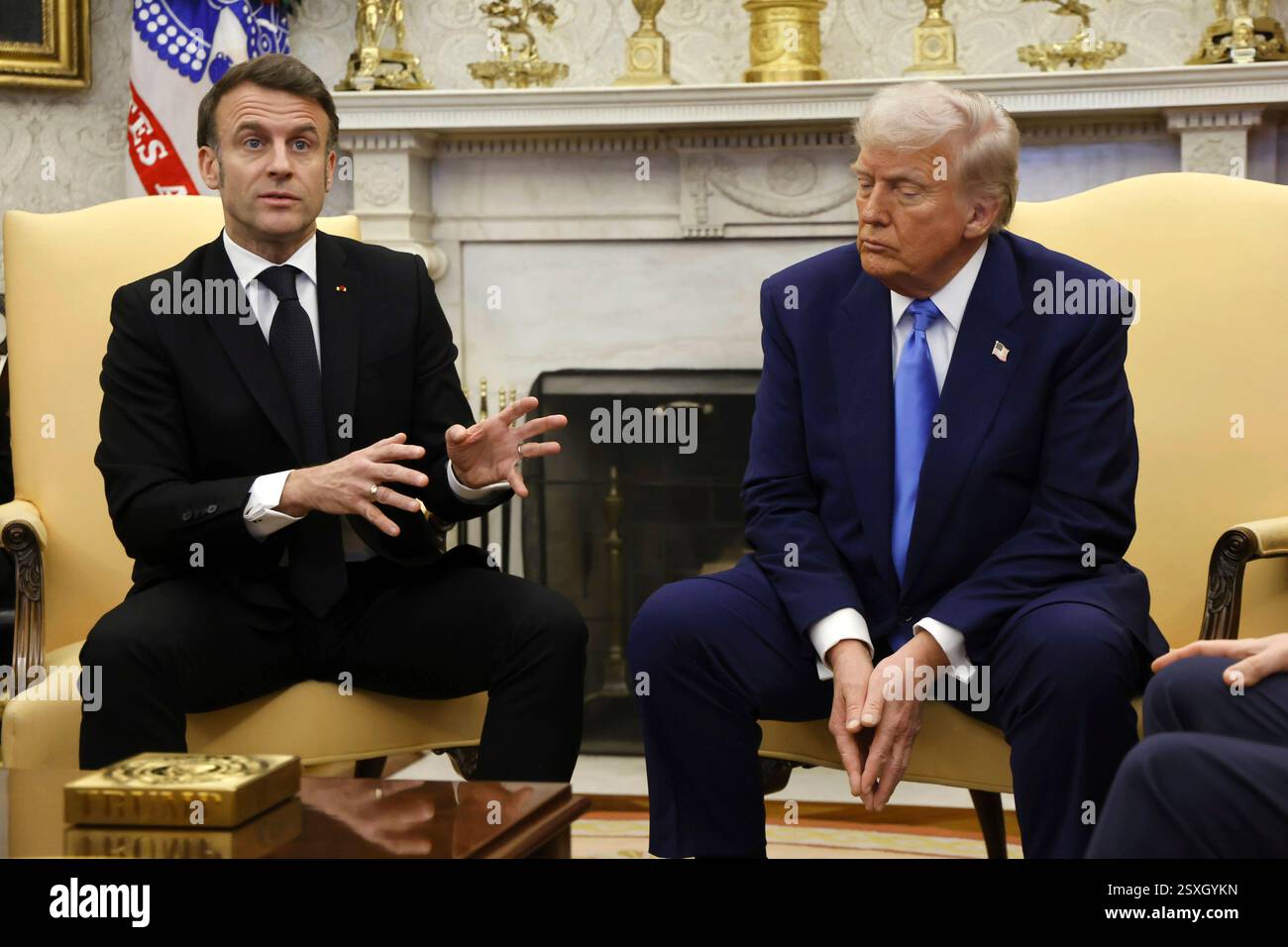 France's President Emmanuel Macron speaks as President Donald Trump ...
