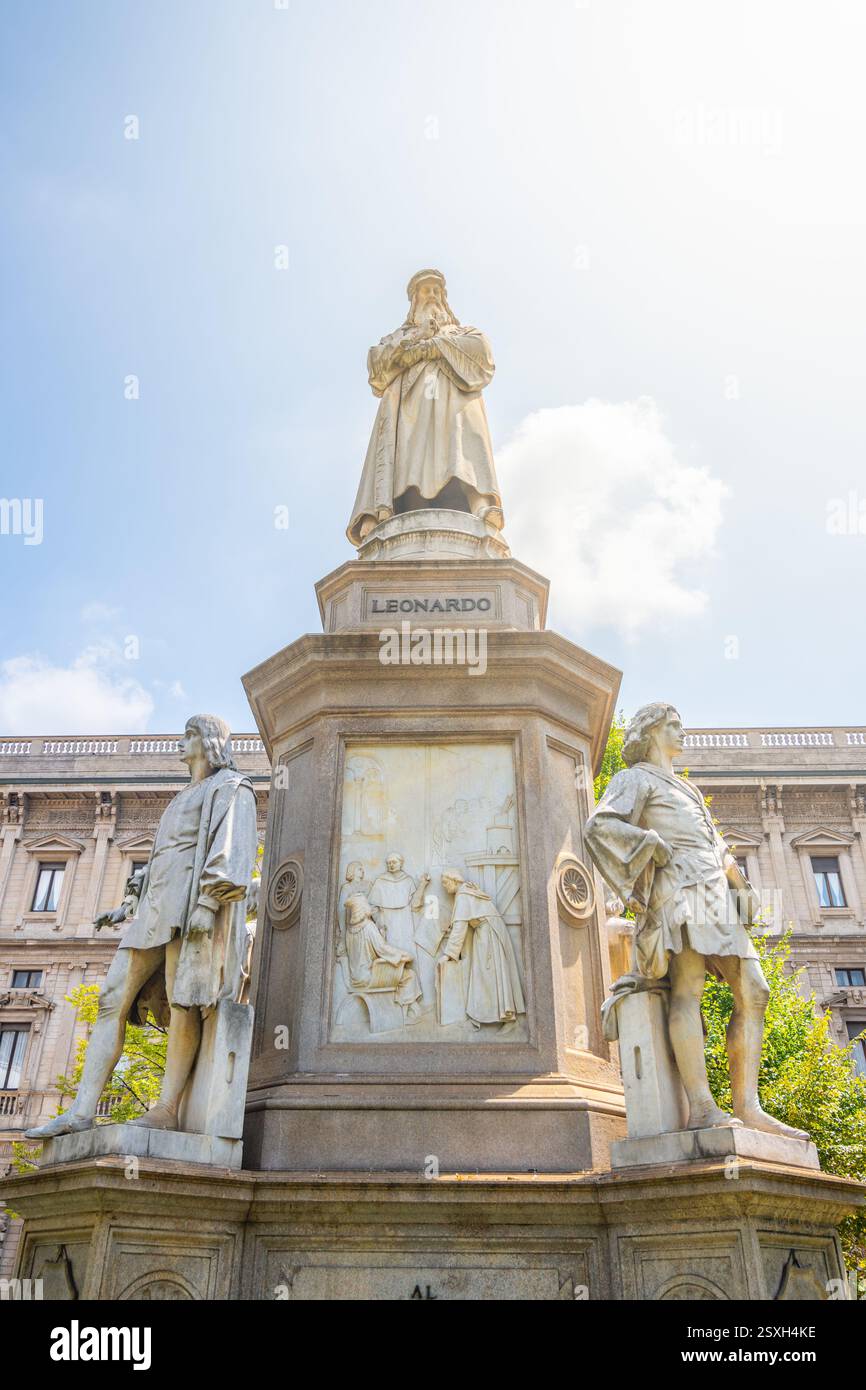 The monument honors Leonardo da Vinci, surrounded by figures ...