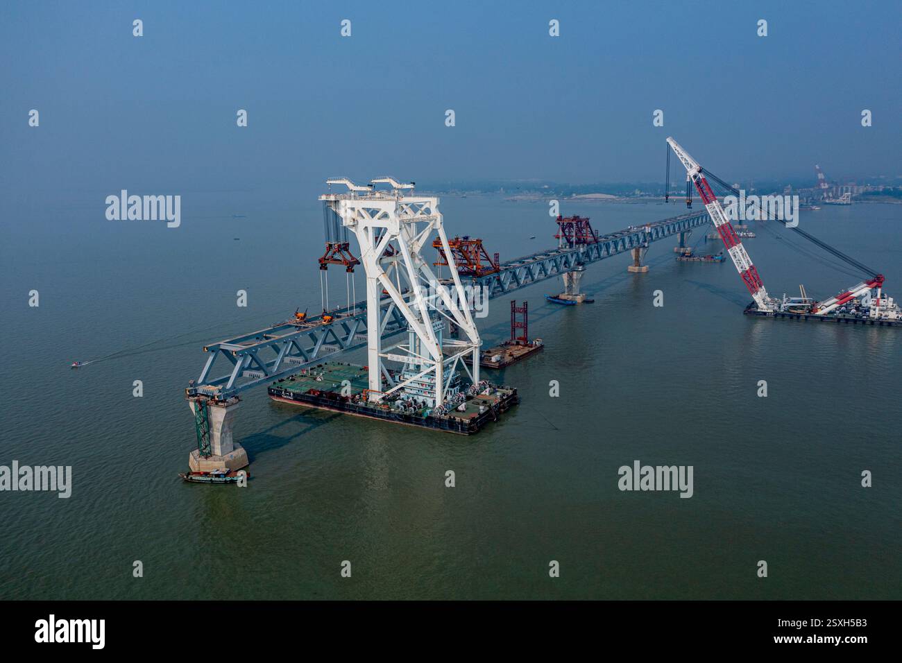 An aerial view of the under-construction Padma Multipurpose Bridge ...