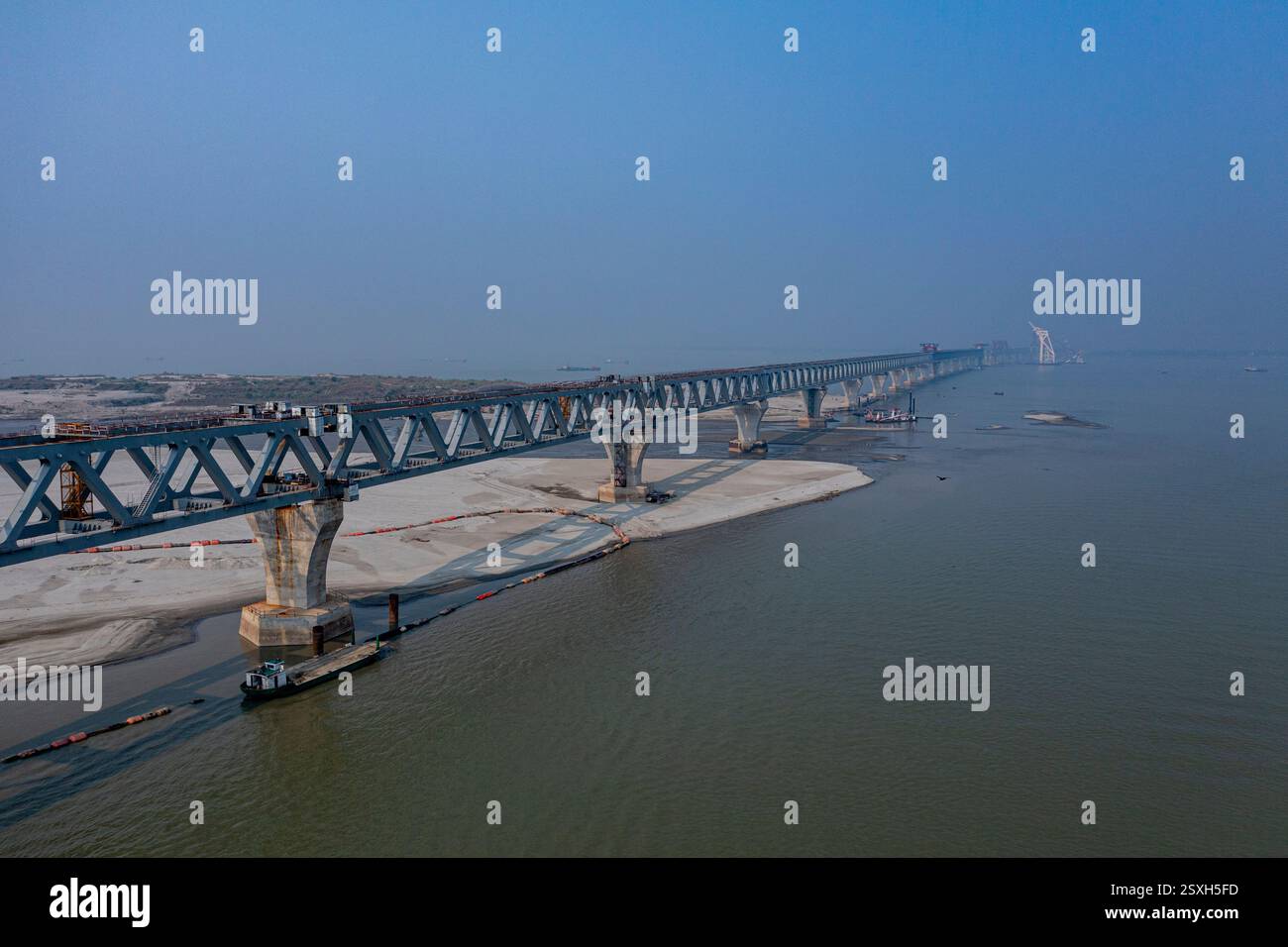 An aerial view of the under-construction Padma Multipurpose Bridge ...
