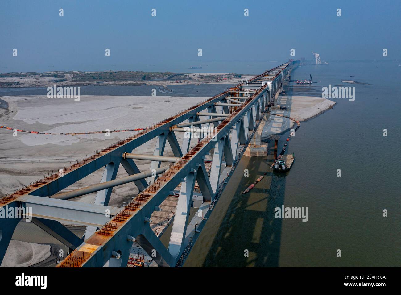 An aerial view of the under-construction Padma Multipurpose Bridge ...