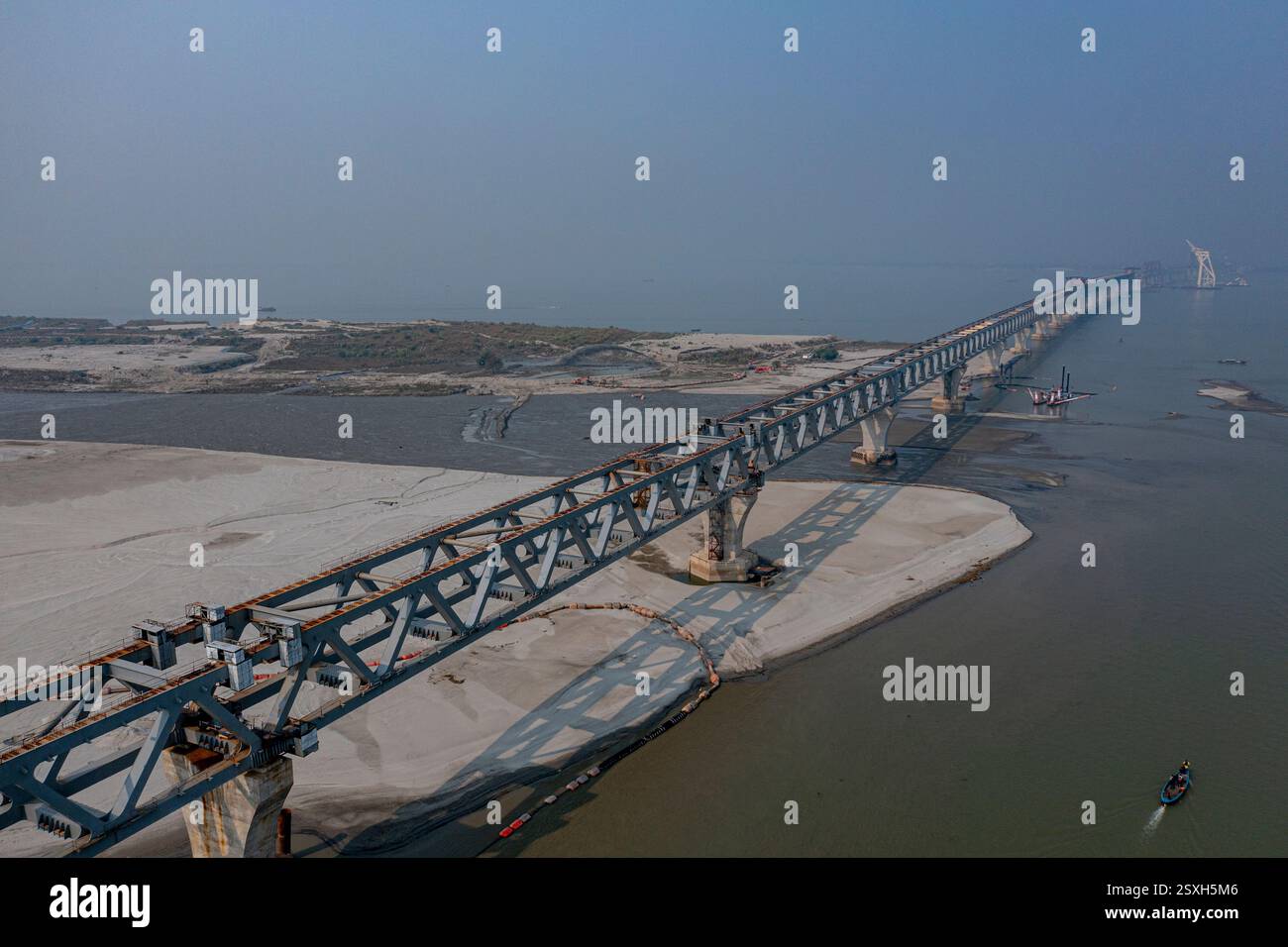 An aerial view of the under-construction Padma Multipurpose Bridge ...