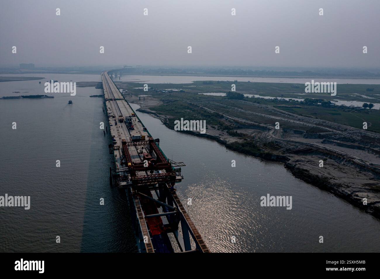 An aerial view of the under-construction Padma Multipurpose Bridge ...