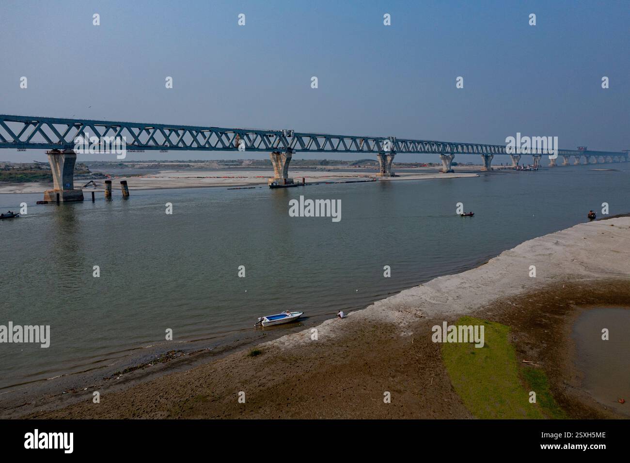 An aerial view of the under-construction Padma Multipurpose Bridge ...
