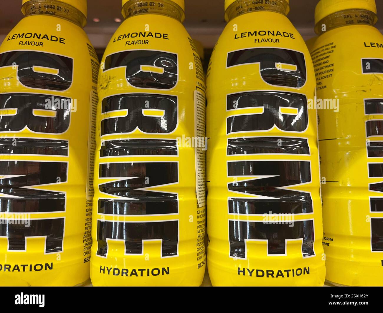 Lemonade flavored Prime hydration drink yellow bottles displayed on a ...