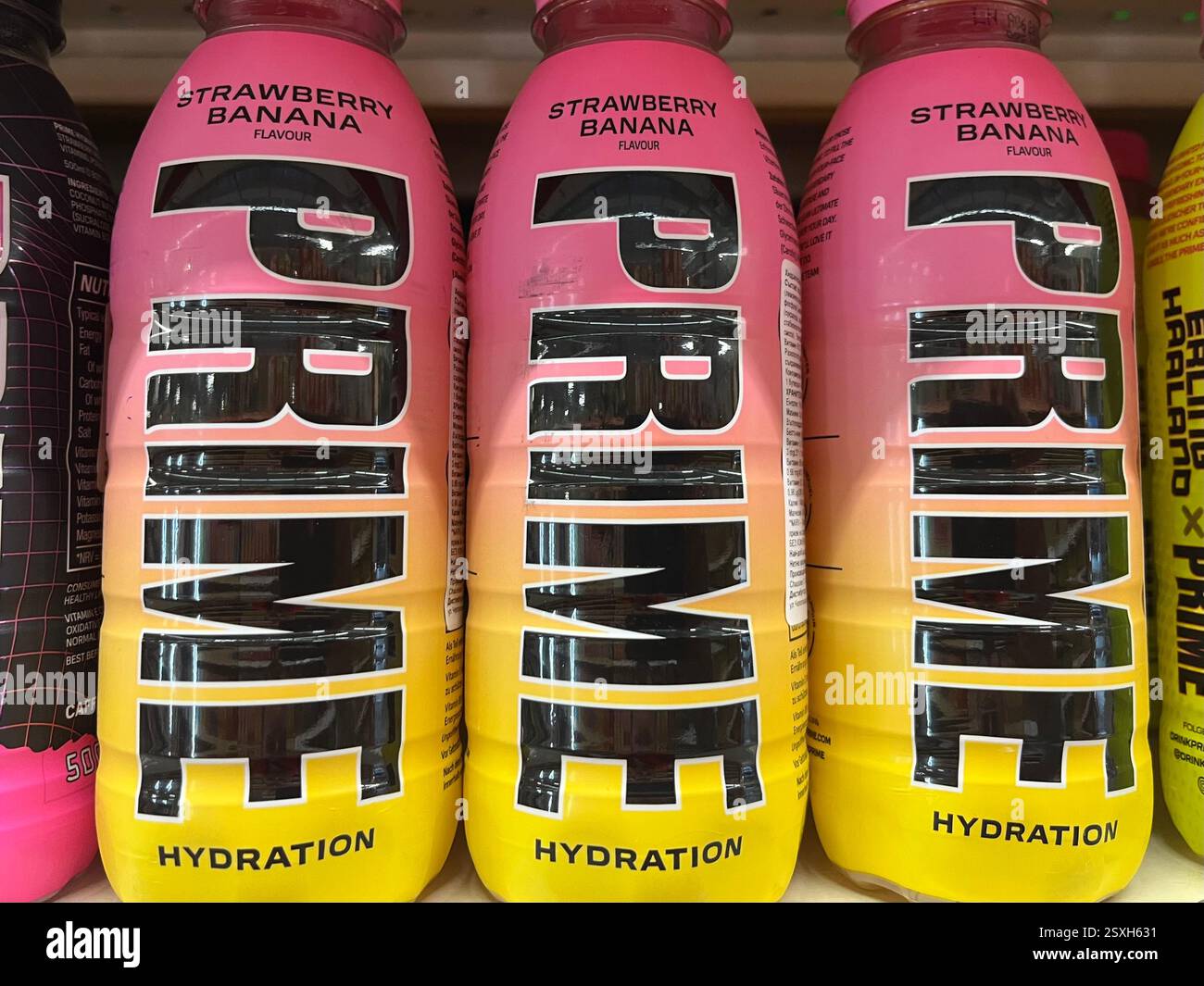 Strawberry and banana flavored Prime hydration drink bottles displayed ...