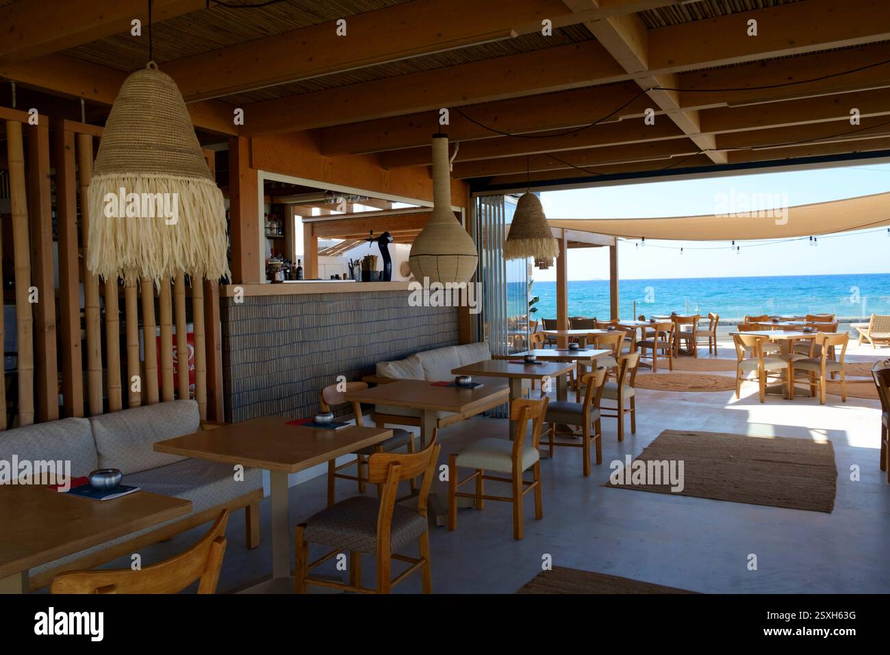 A Greek island beach bar overlooking the sea Stock Photo - Alamy