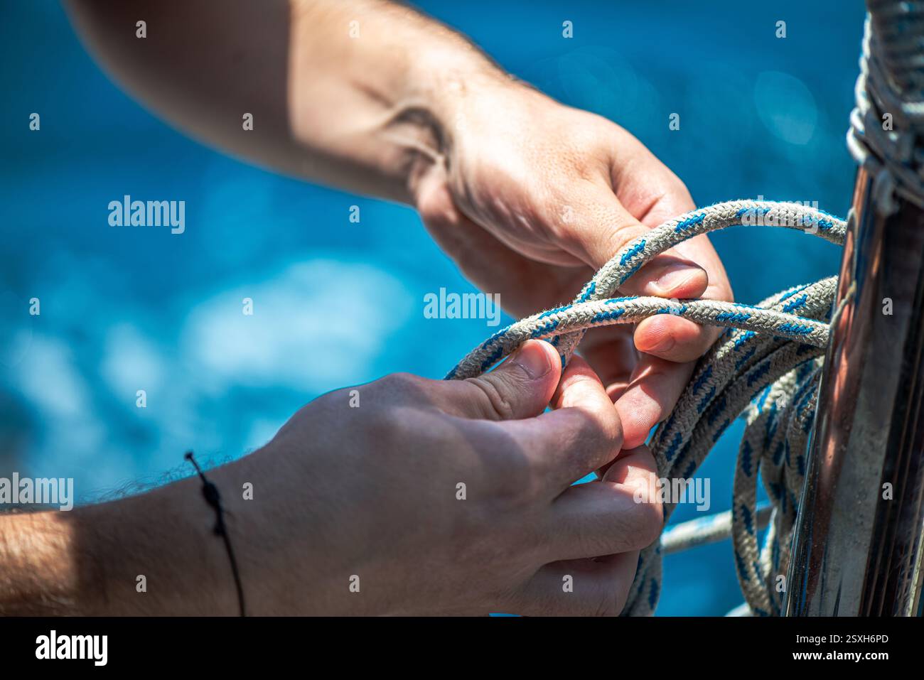Hands close up ship rigging hi-res stock photography and images - Alamy