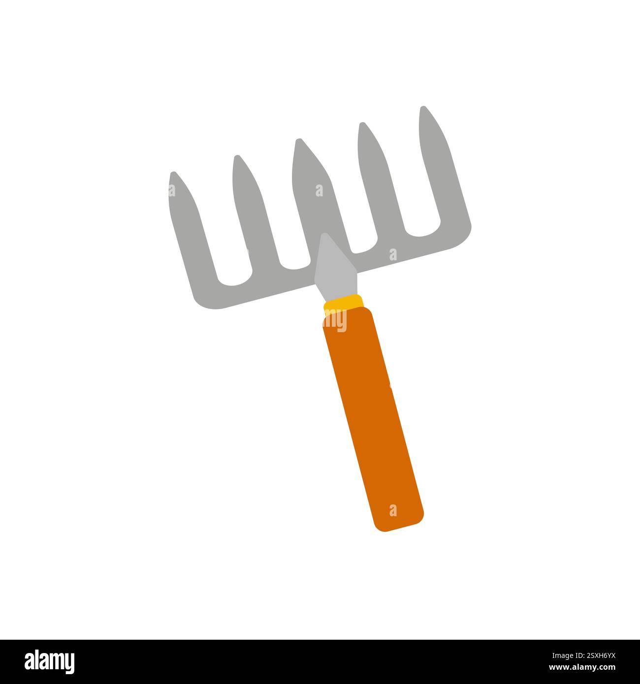 A four-pronged rake with a wooden handle lies ready for use in a spring ...