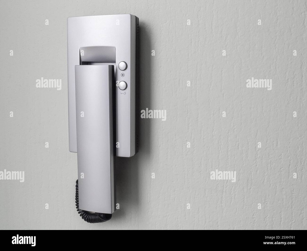 intercom receiver on a light-colored wall Stock Photo - Alamy