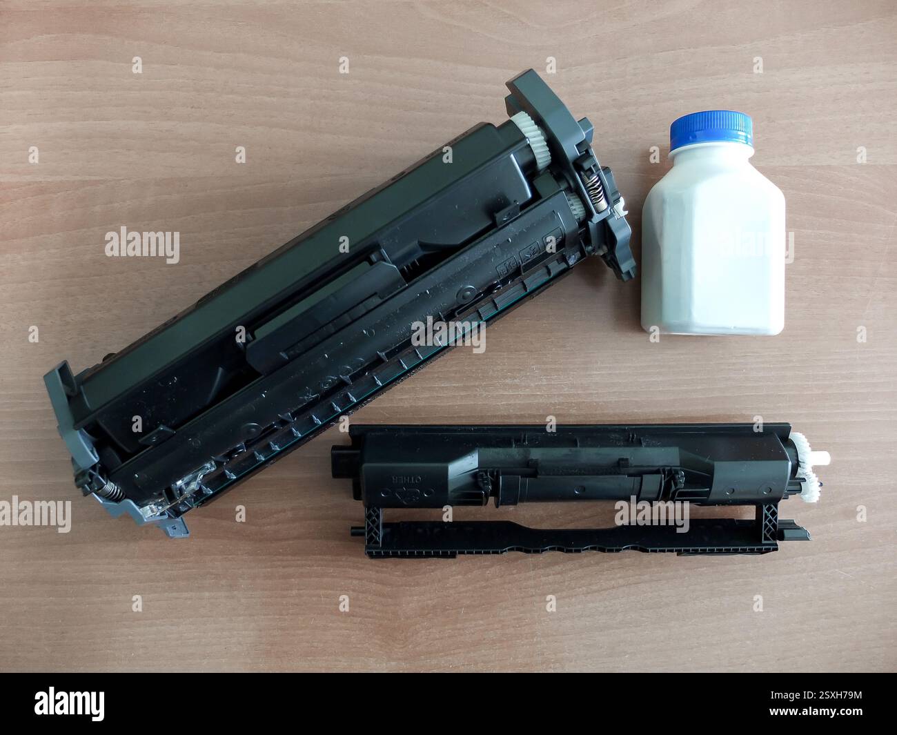 Refilling the laser printer toner cartridge Stock Photo - Alamy