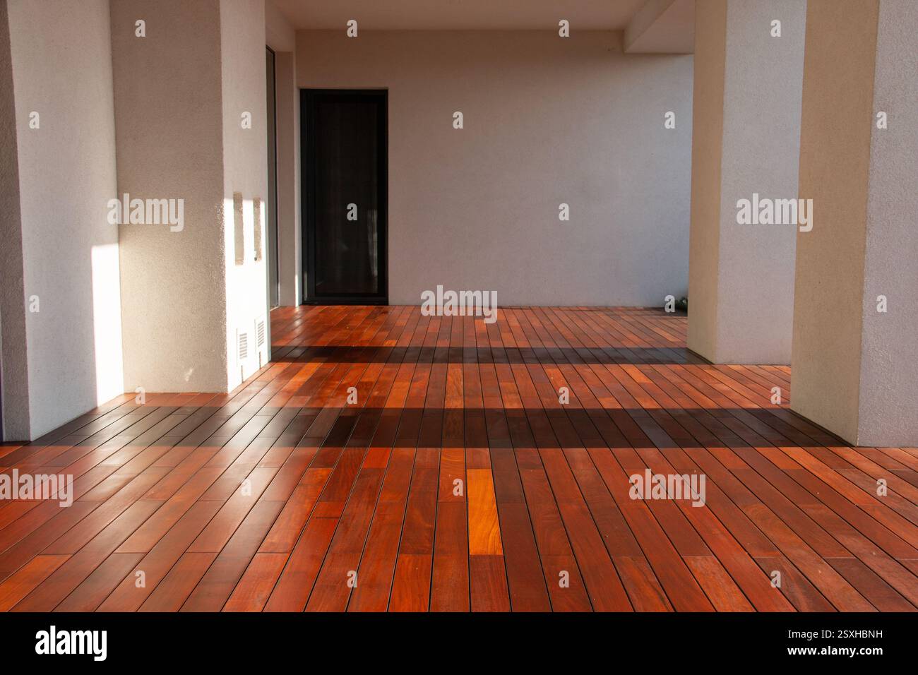 Modern architecture atrium house with concrete walls and hardwood deck ...