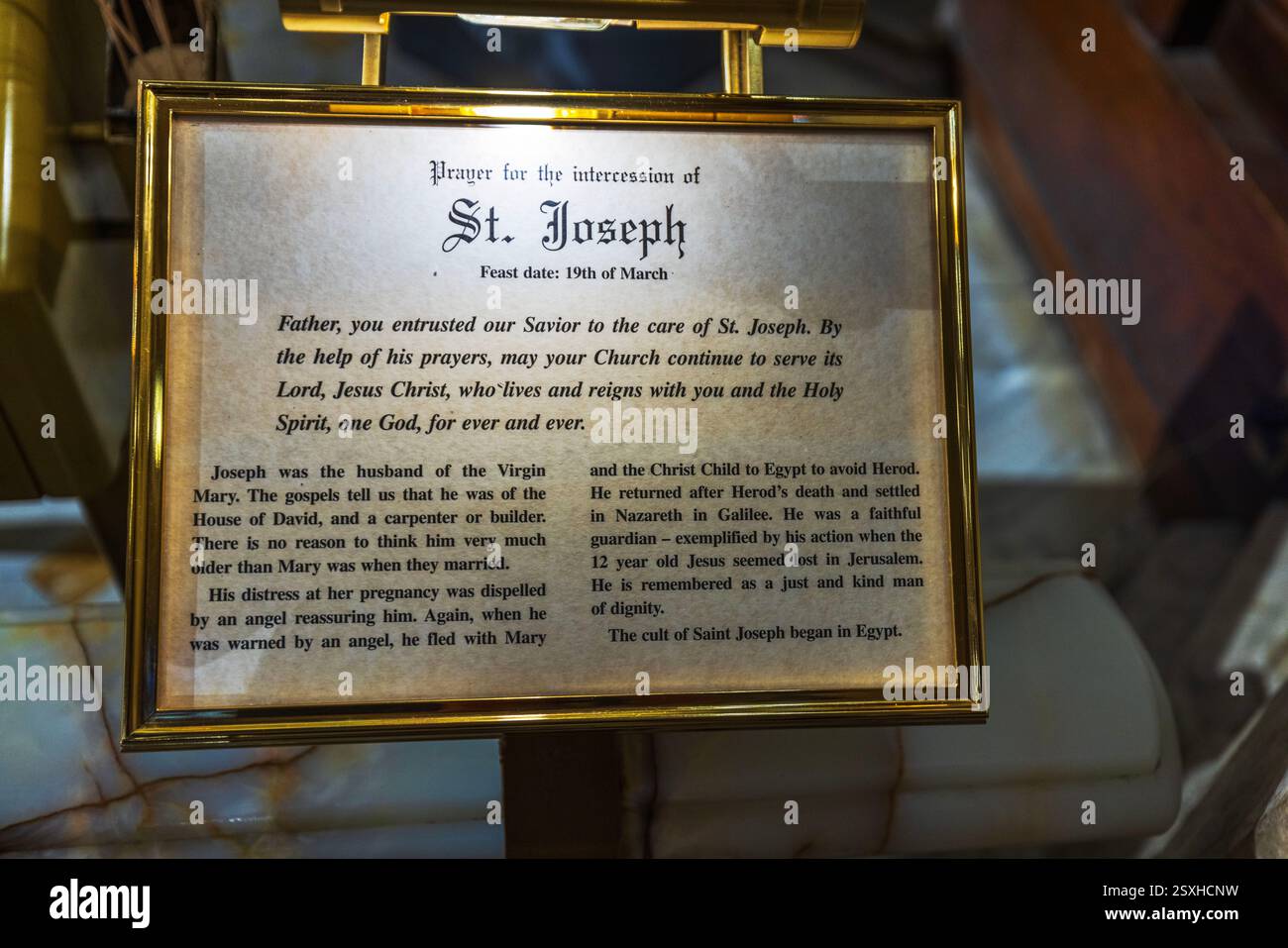 Framed prayer for St. Joseph with religious text on display inside St ...