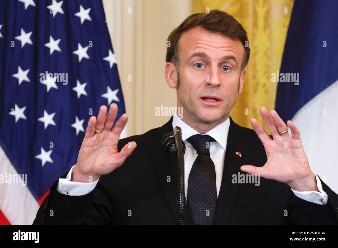 France's President Emmanuel Macron speaks during a joint press ...