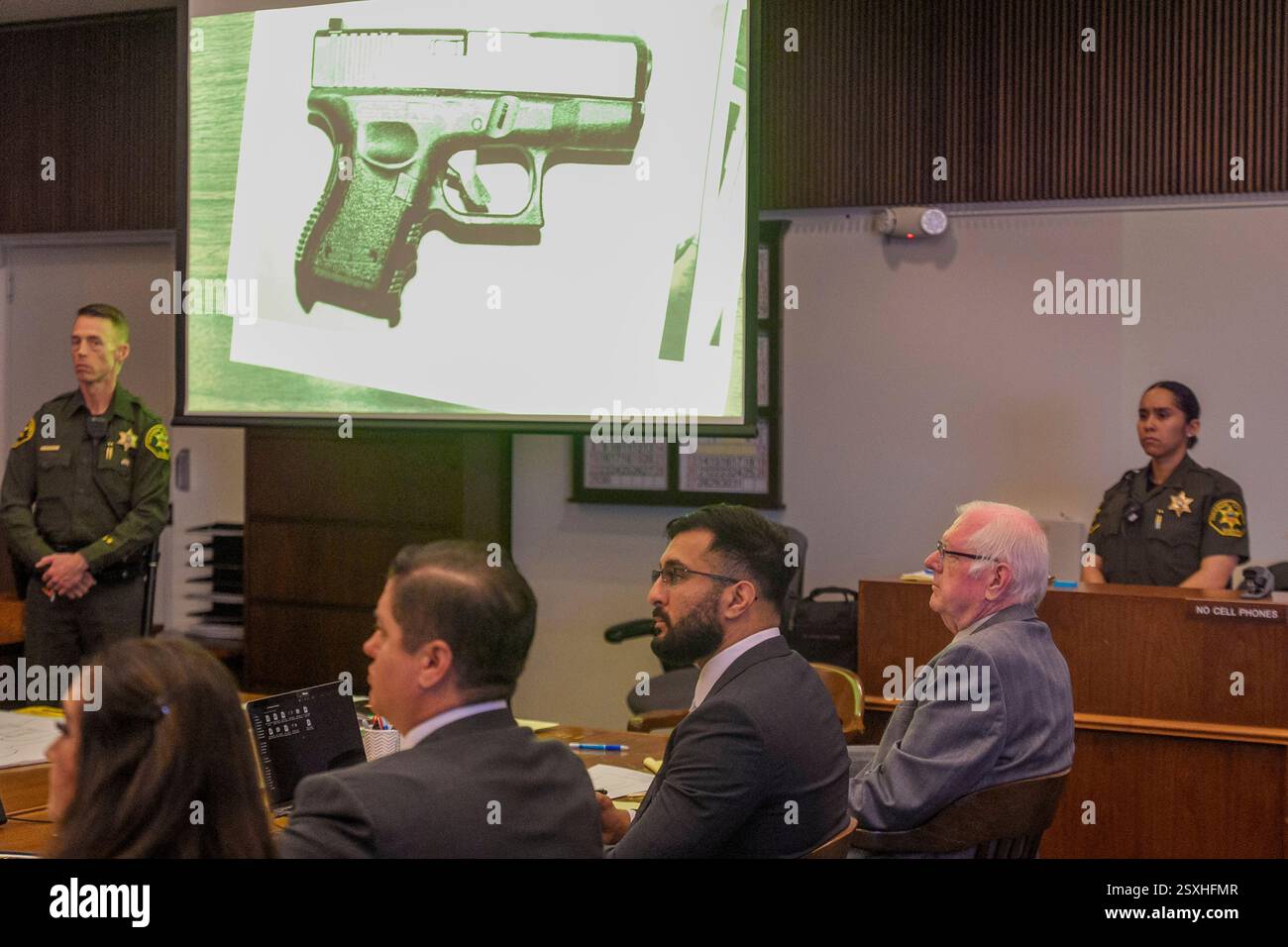 Orange County Superior Court Judge Jeffrey Ferguson, sitting far right ...