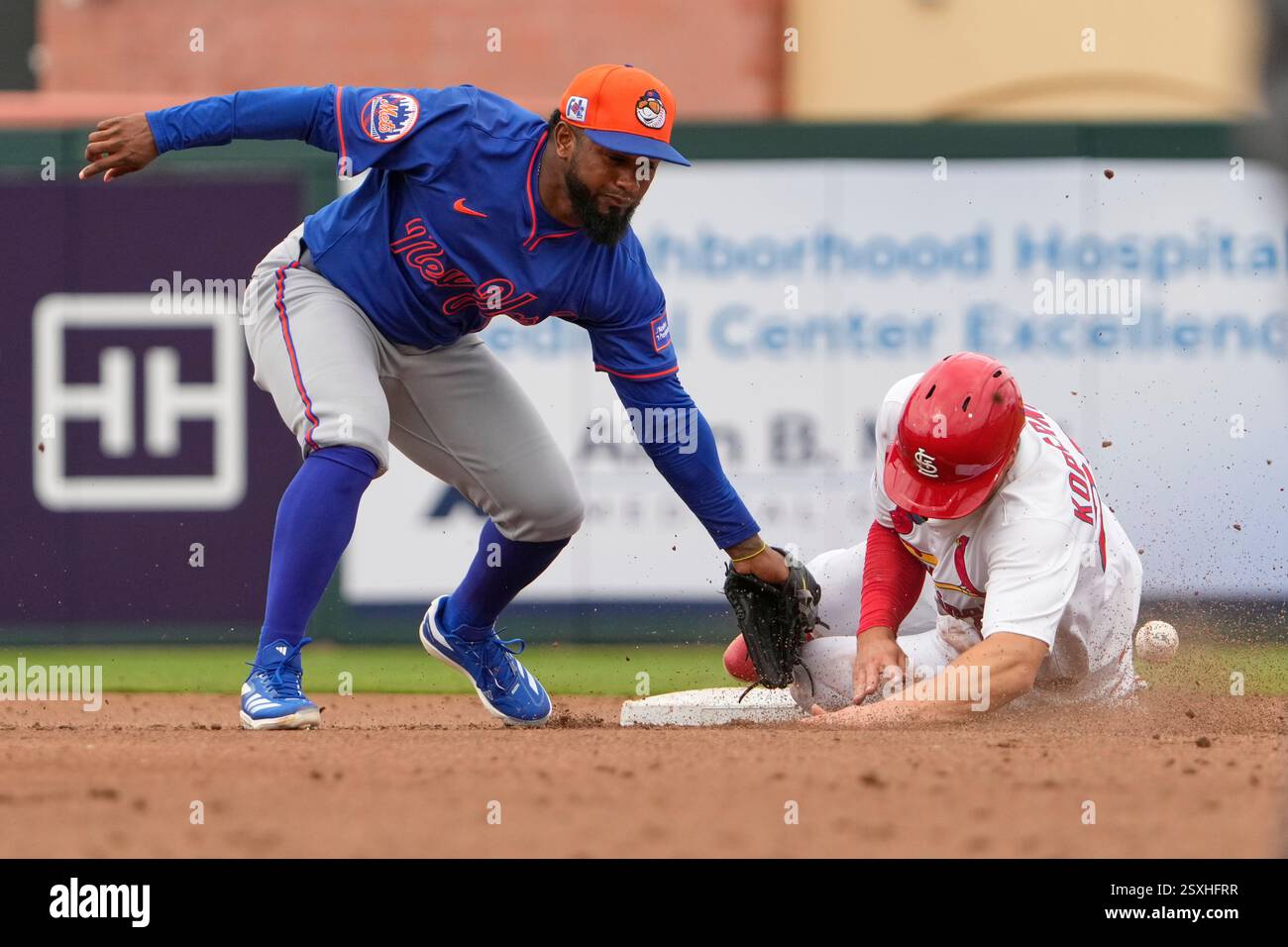 St. Louis Cardinals' Matt Koperniak, right, is safe at second for a ...