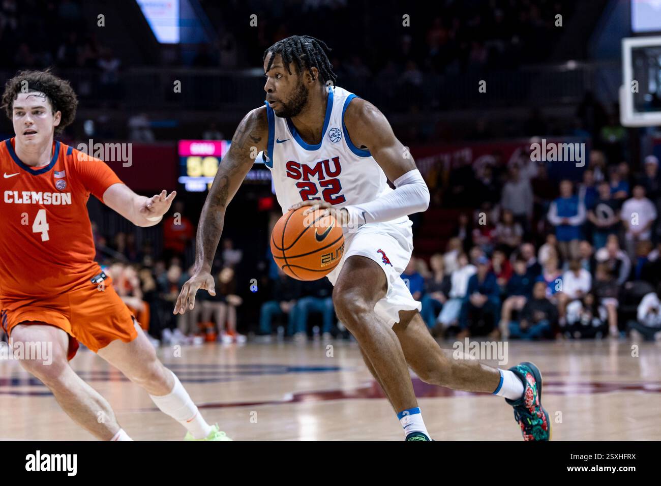 DALLAS, TX - FEBRUARY 22: SMU Mustangs forward Matt Cross (#33) drives ...