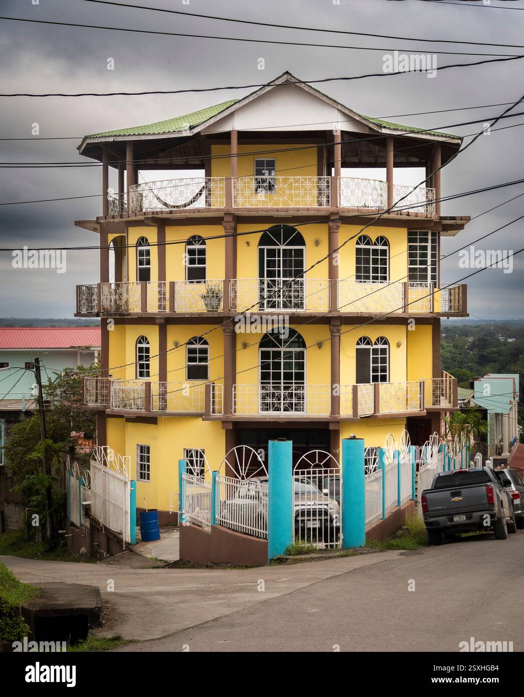 Multi-sided yellow house in San Ignacio, Cayo District, Belize Stock ...