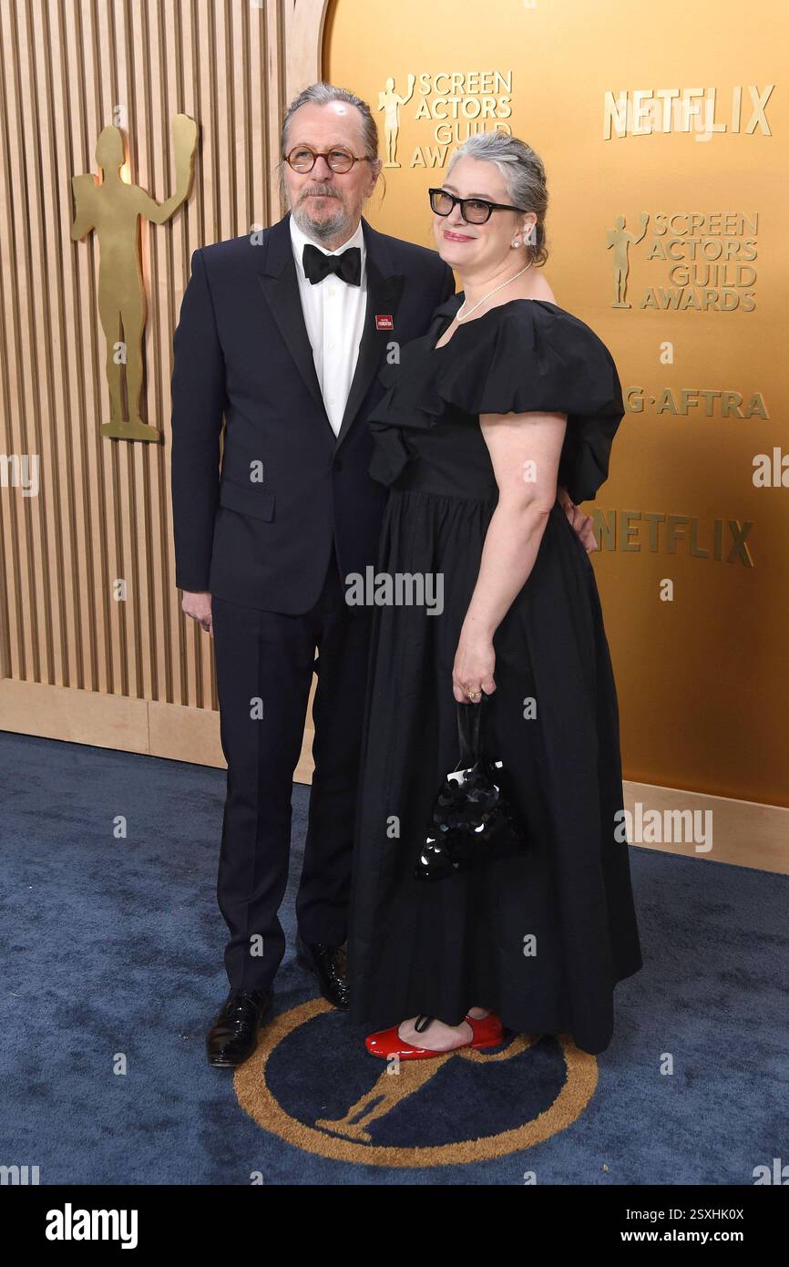 Gary Oldman umit Ehefrau Gisele Schmidt bei der Verleihung der 31 ...
