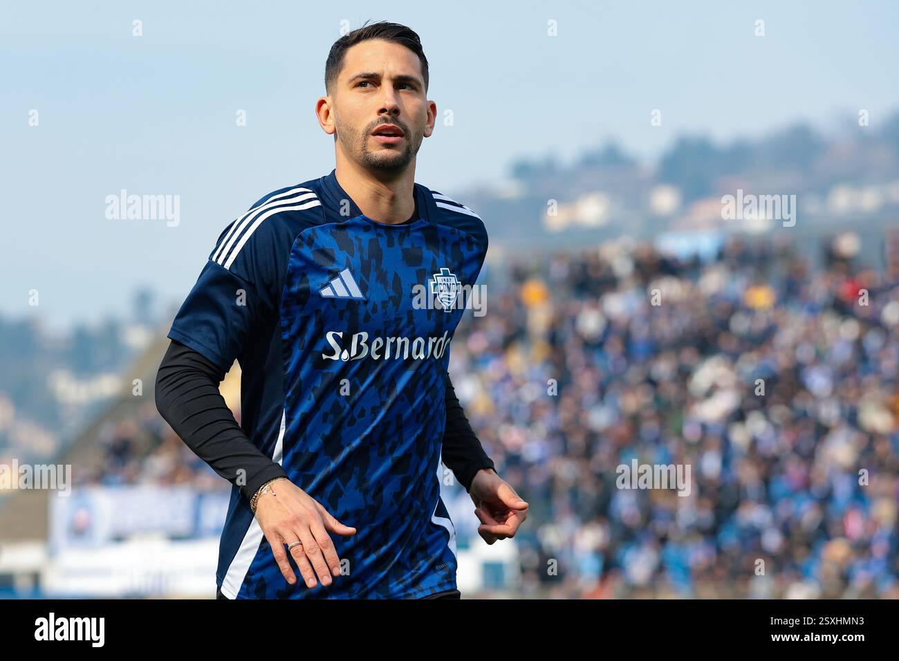 Como, Italy. 23rd Feb, 2025. Edoardo Goldaniga of Como 1907 leaves the ...