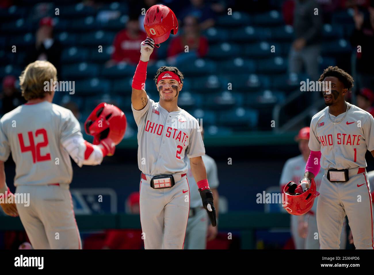 Ohio State Buckeyes Tyler Pettorini (42) greeted at home by Trey Lipsey ...