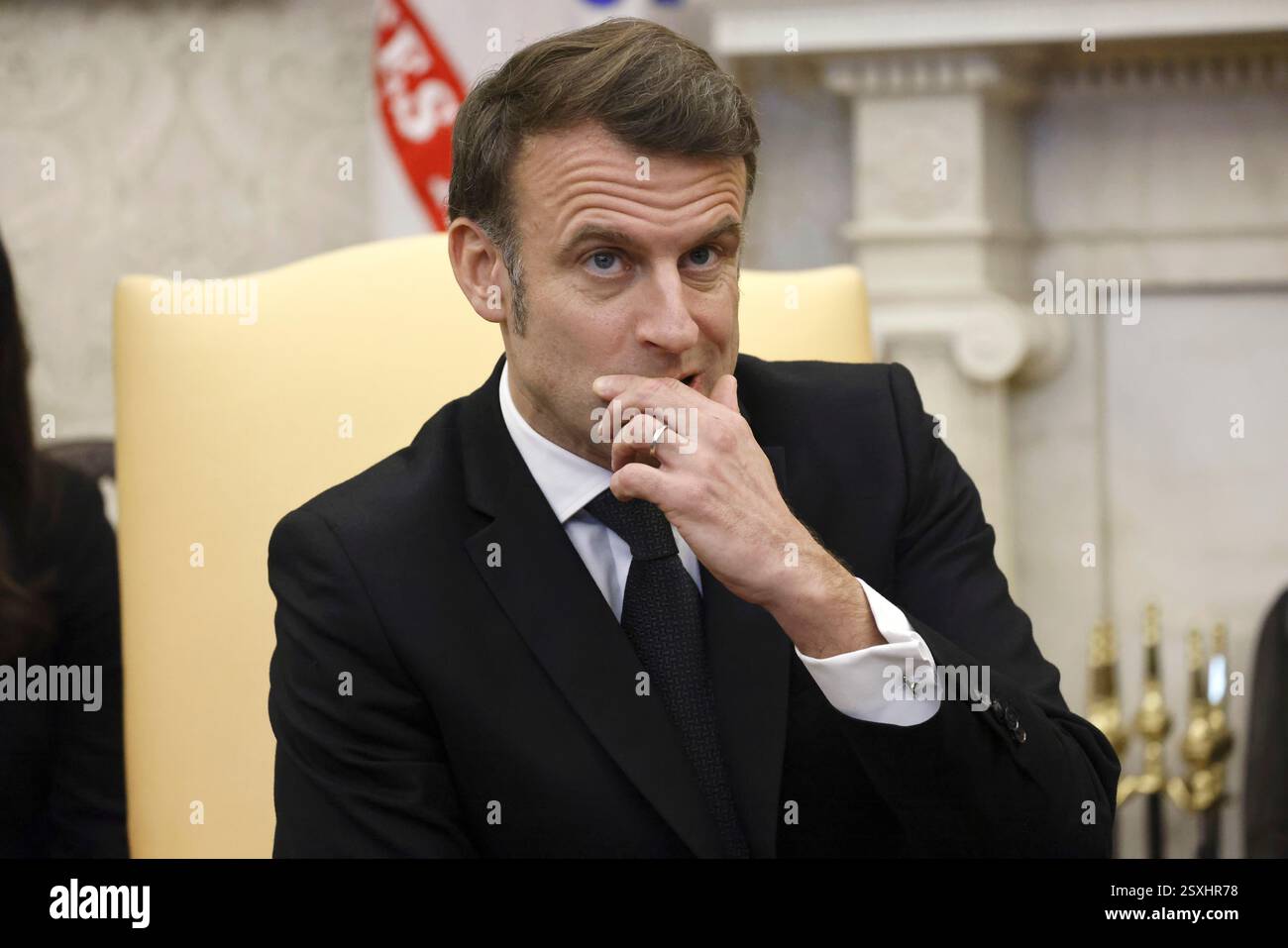 France's President Emmanuel Macron listens during a meeting with ...