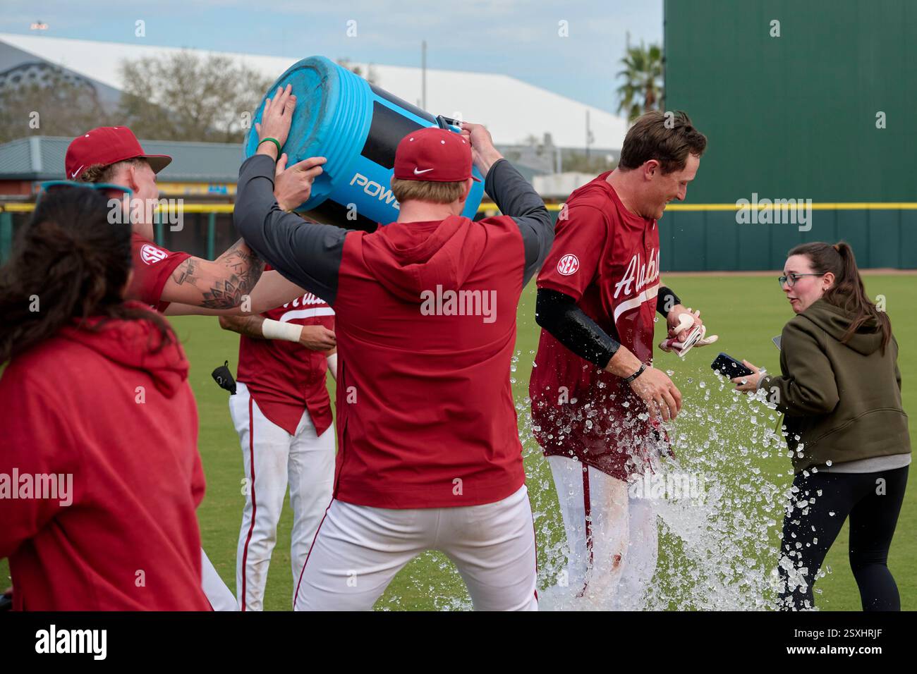 Alabama Crimson Tide Will Hodo (18) is doused with water after hitting ...