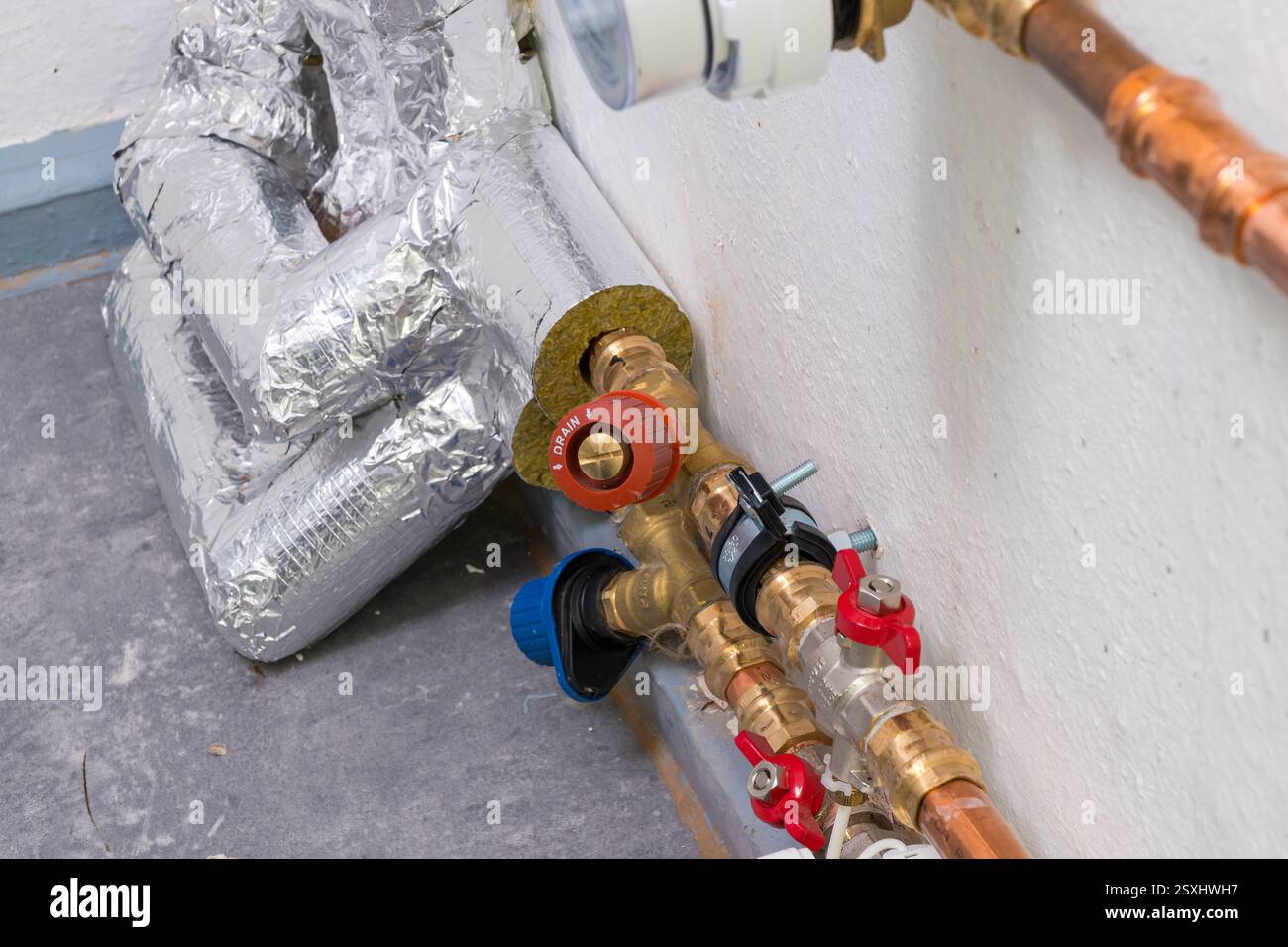 Insulating heating and hot water pipes in a basement helps reduce heat ...