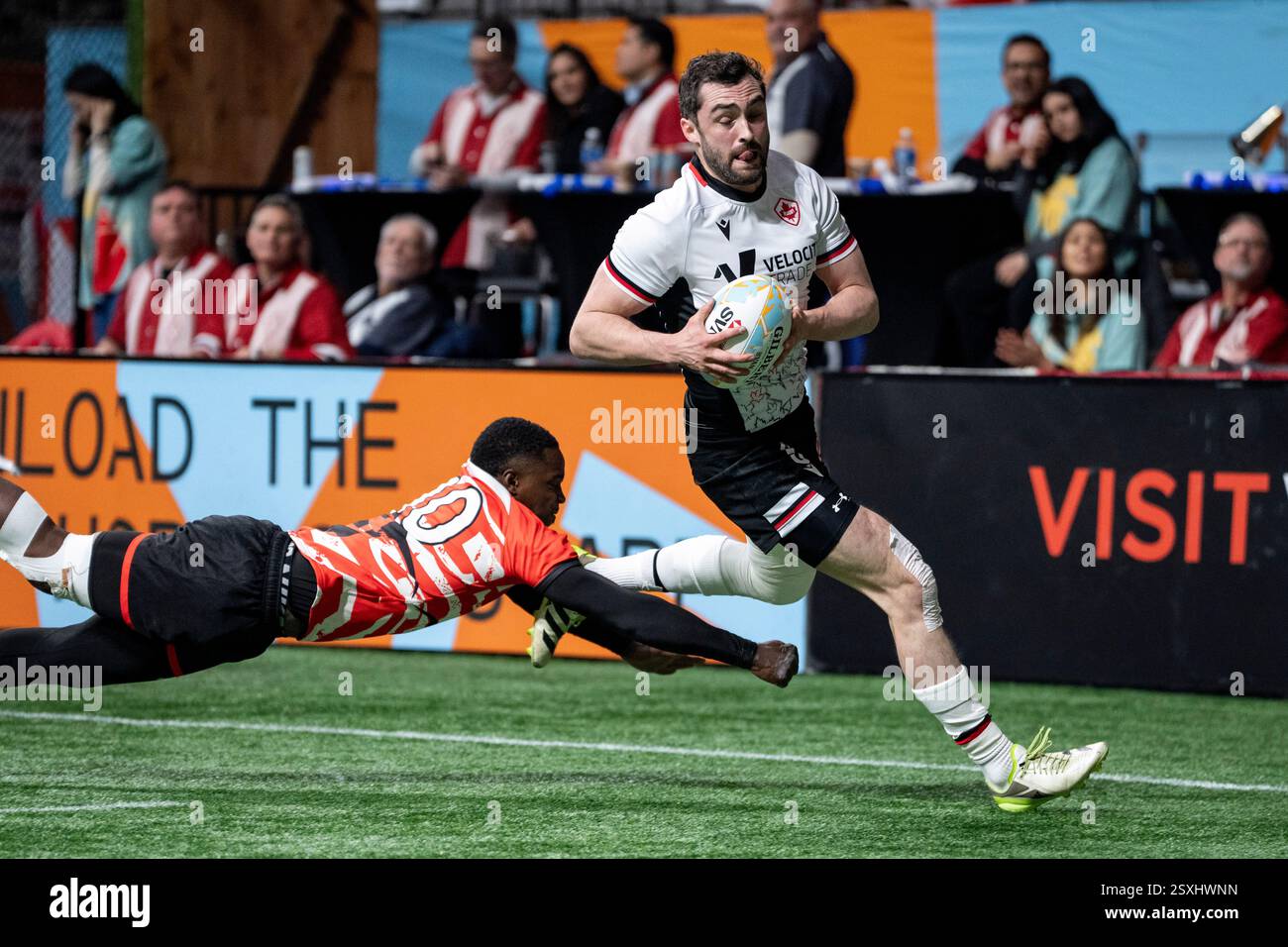 Vancouver, Canada. 21st Feb, 2025. Canada's Alex Russell scores a try ...
