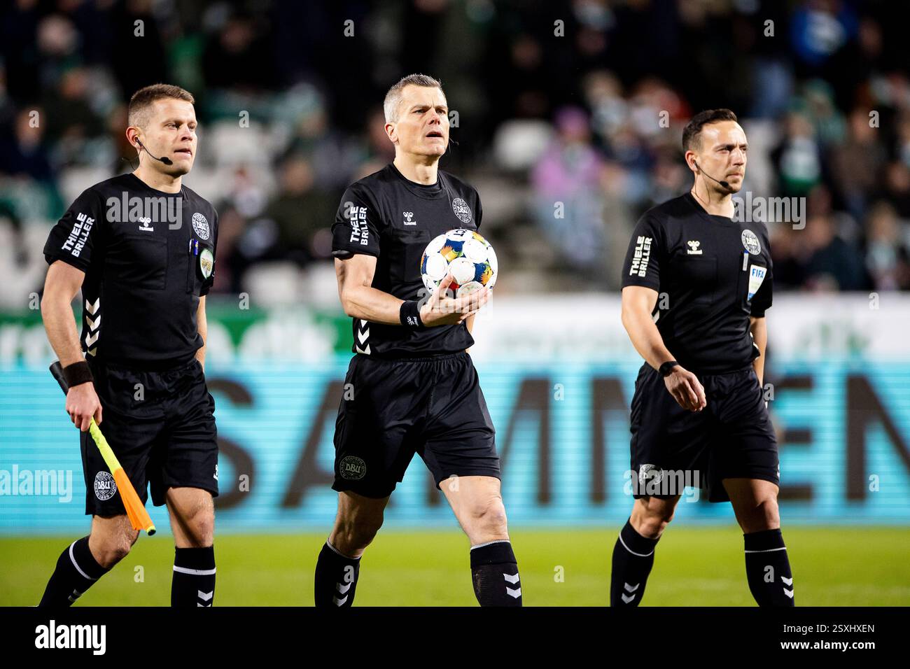 The match referee (in the middle) Michael Tykgaard during the Superliga ...