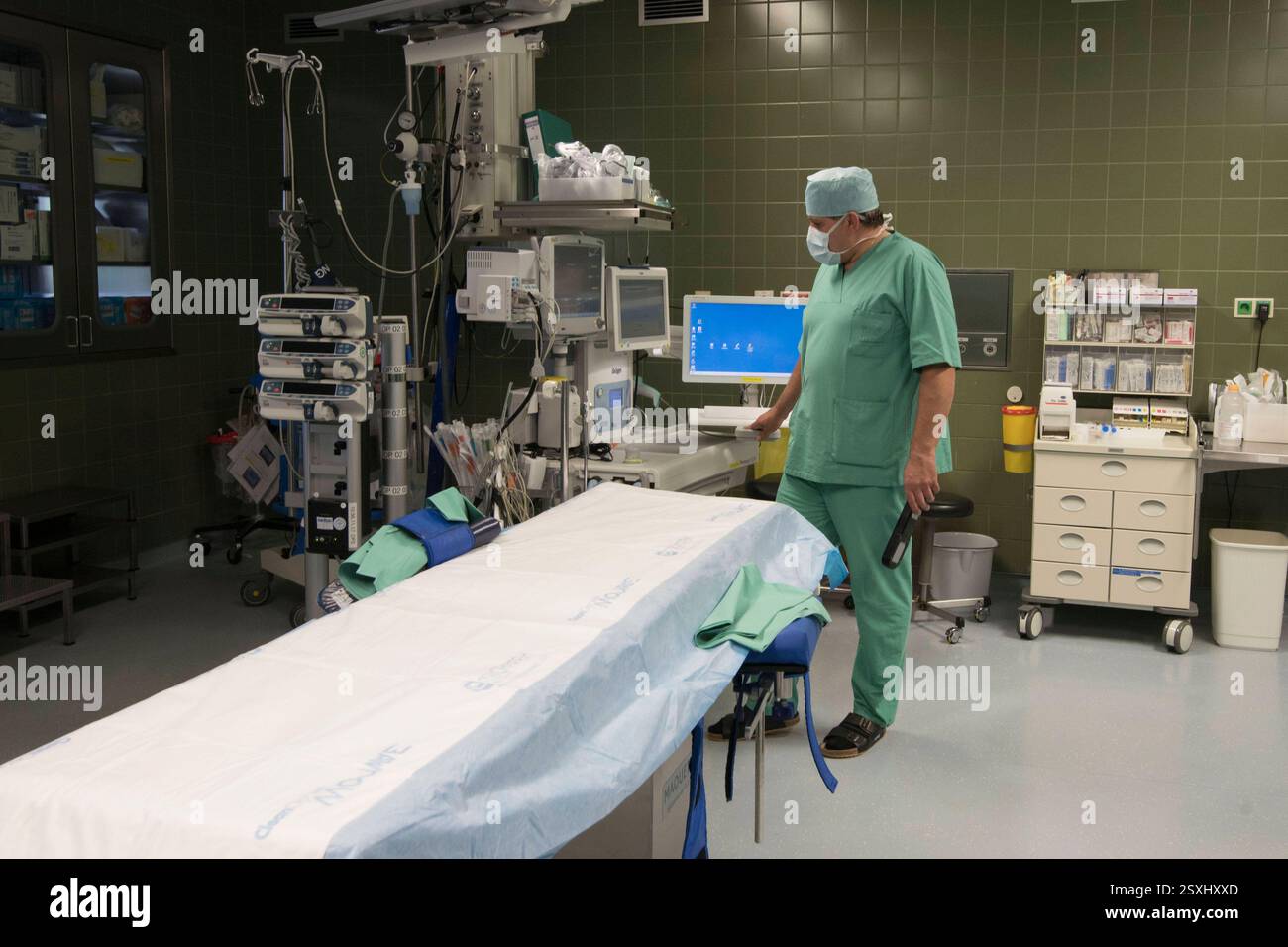 a surgery in an operation room in the hospital, medical intervention ...