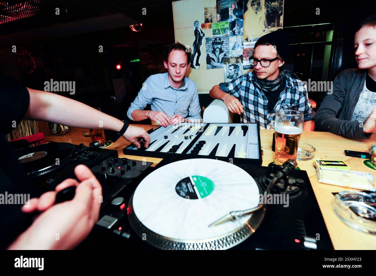 a backgammon board with pieces and dice, two player board game a ...