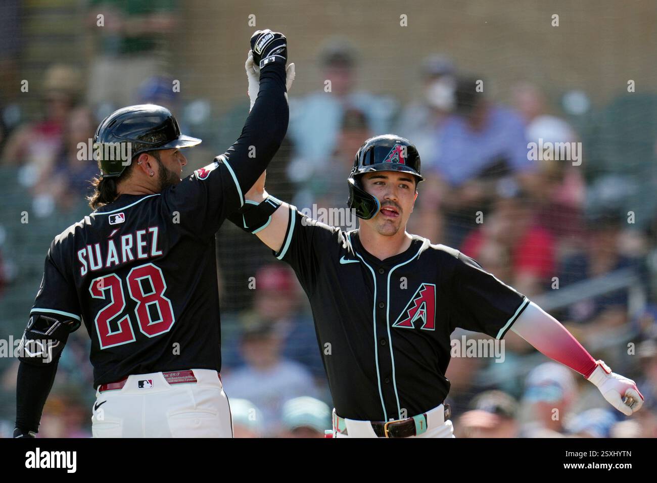 Arizona Diamondbacks' Corbin Carroll, right, celebrates after his home ...